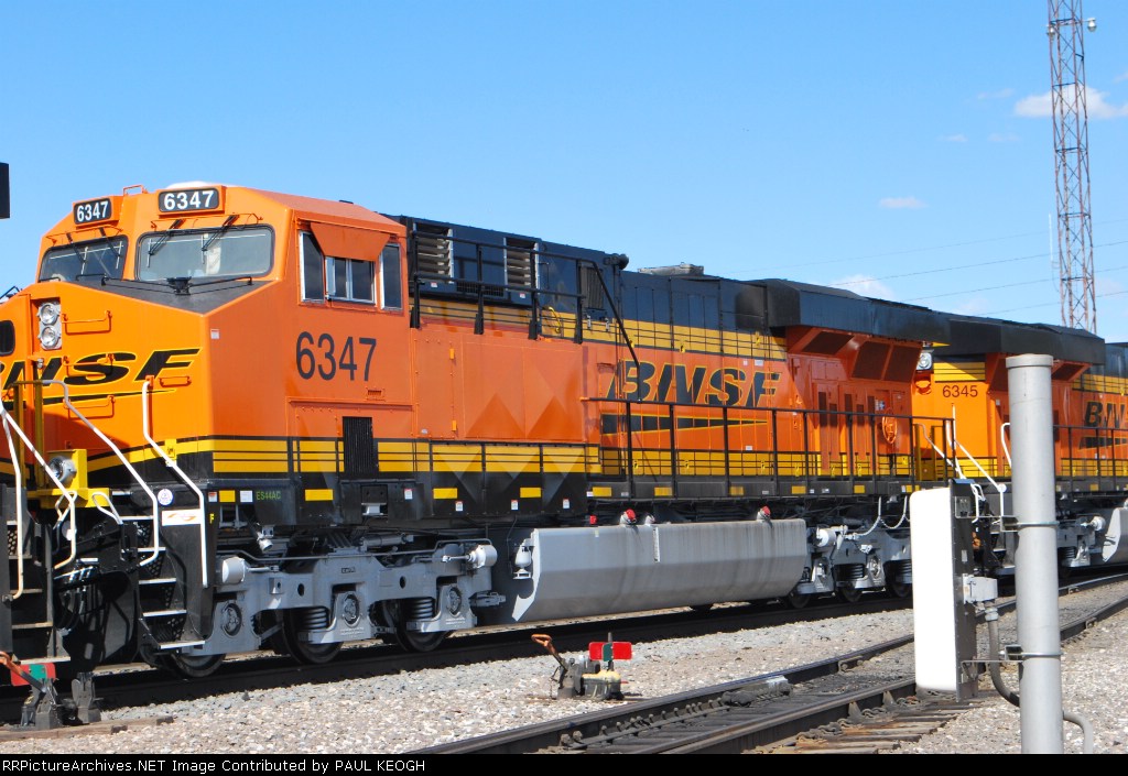 BNSF 6347 with BNSF 6345 as lead unit cross the Platte River Bridge into the BNSF Denver yard as ...